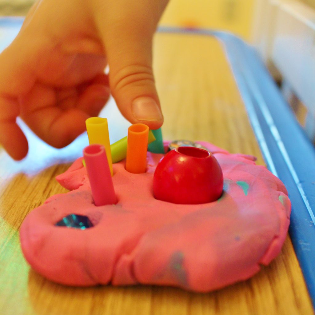 Decorating Playdough With Beads - Raising Hooks