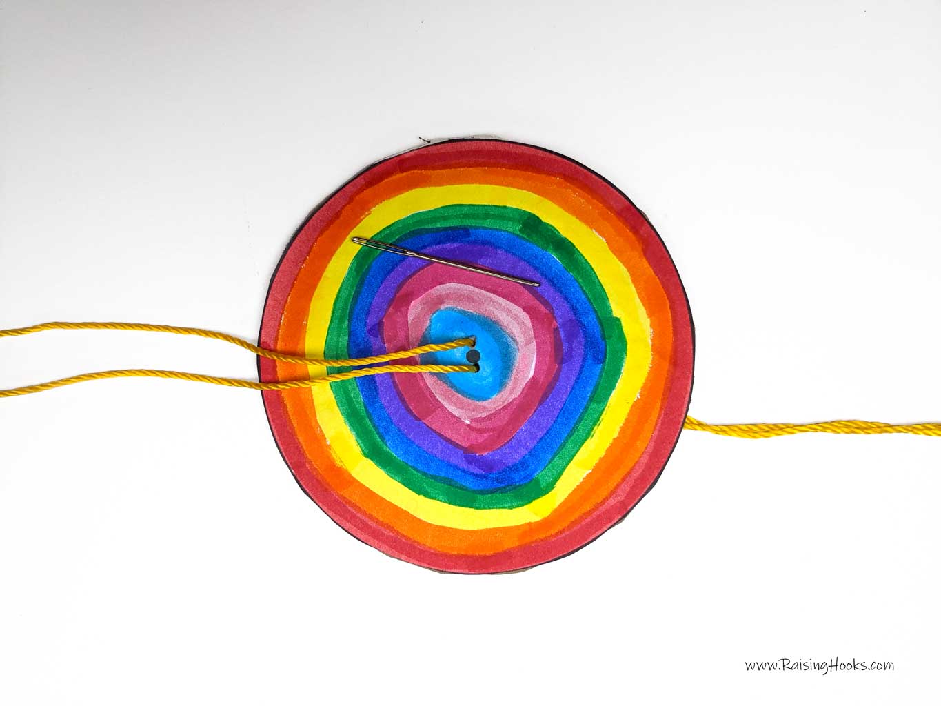 Make Your Own Colorful Paper Spinners - Raising Hooks